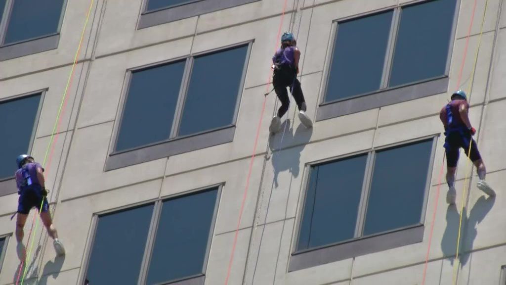 People Rappel From Building to Raise Money for Make-A-Wish Foundation