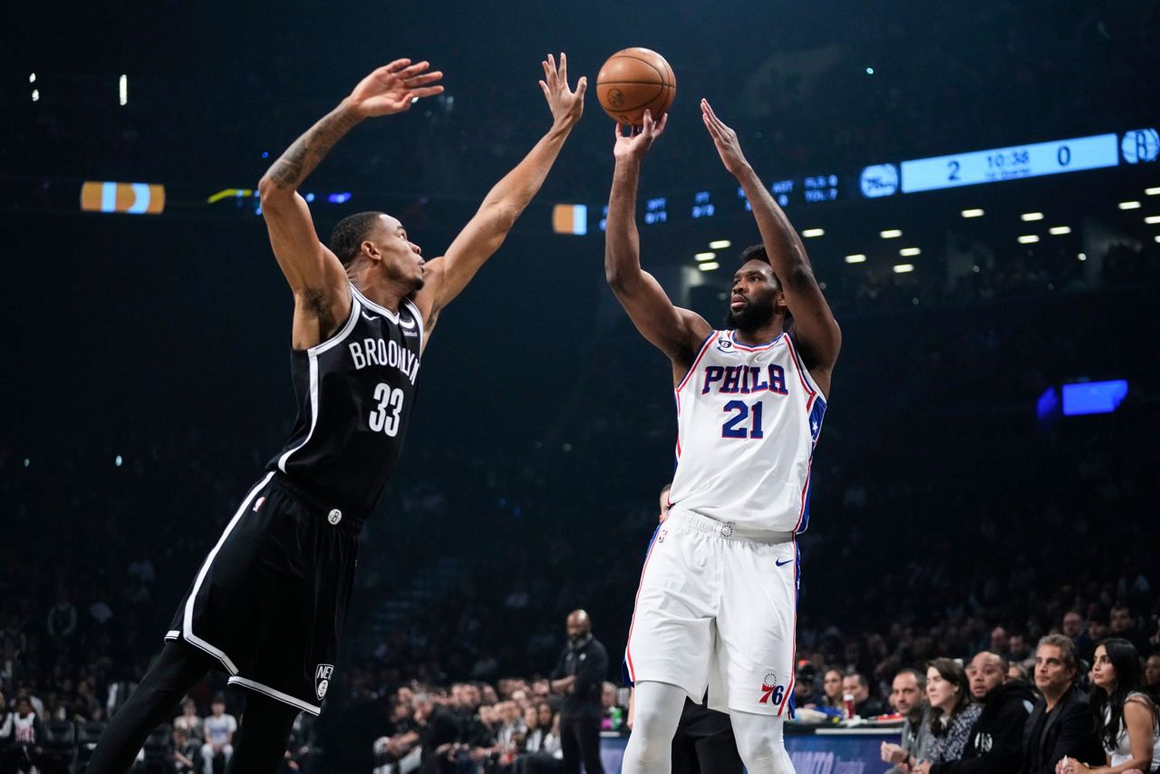 Embiid gets tech but no ejection for groin kick to Claxton