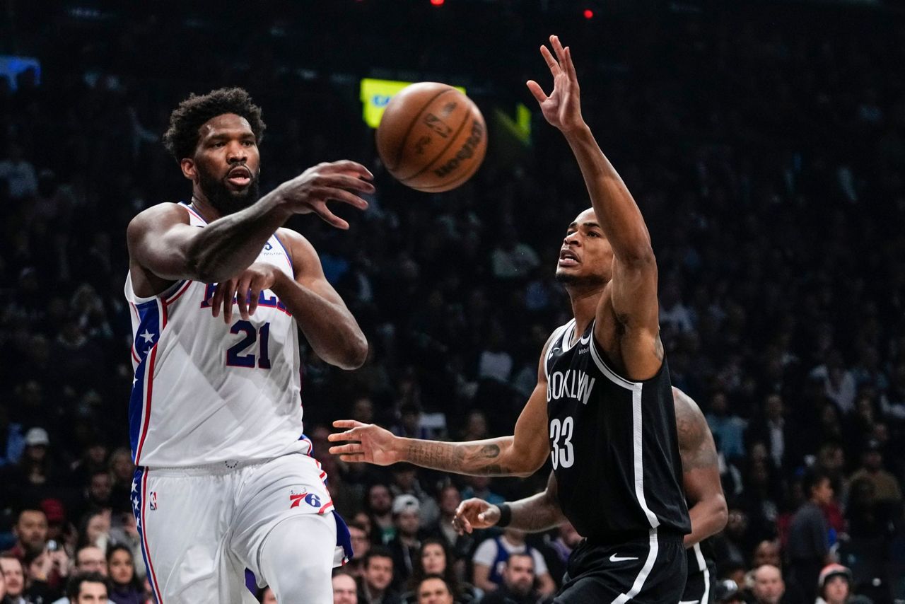 Embiid gets tech but no ejection for groin kick to Claxton