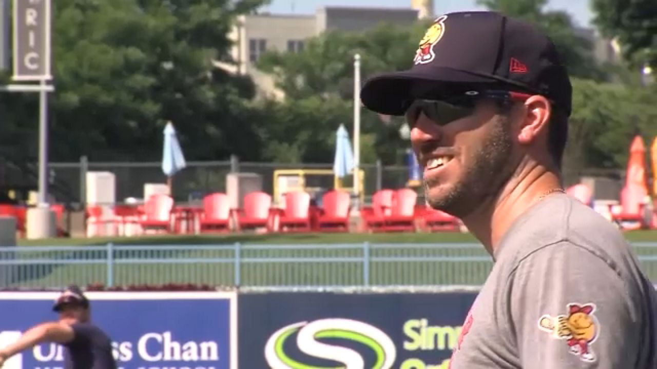 WooSox Tracy & Red Sox Abraham work together & WooSox HOF