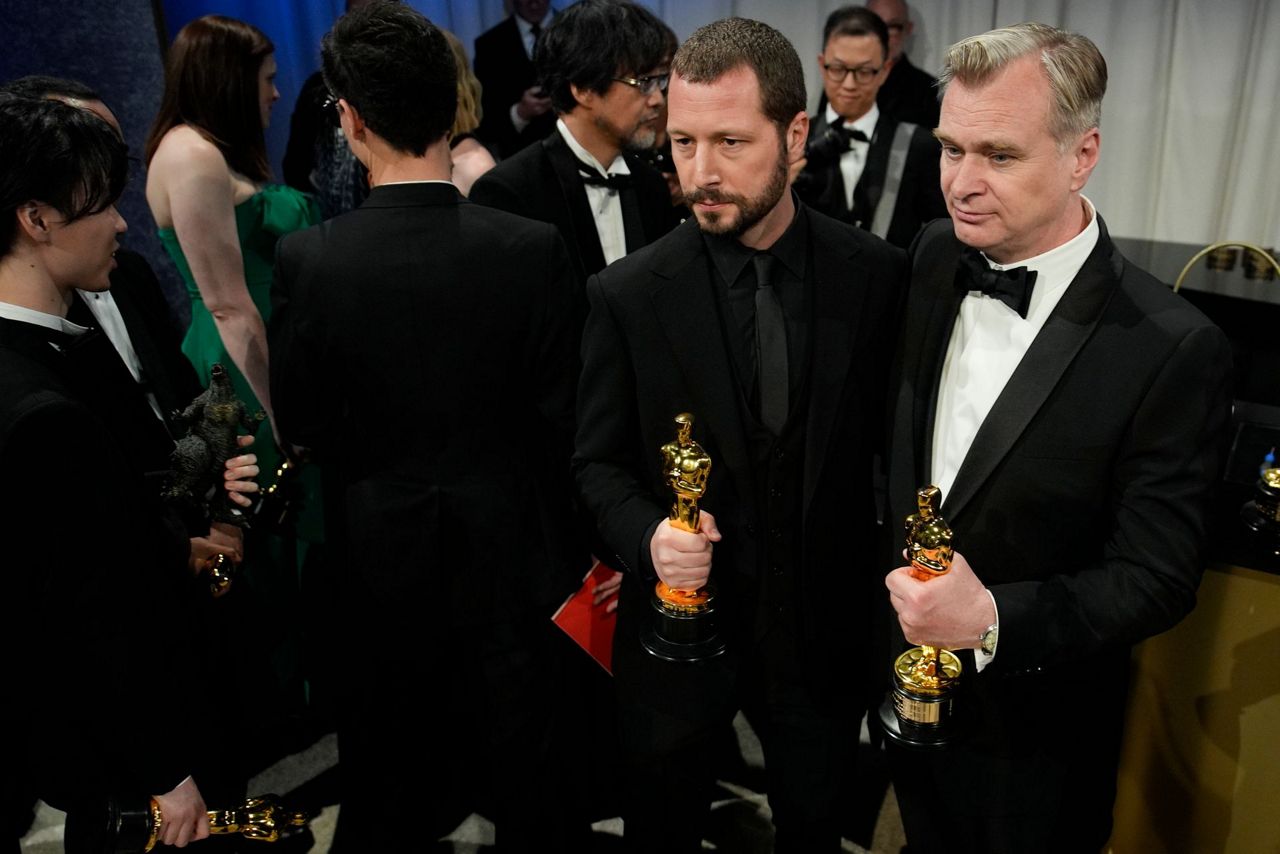 'Oppenheimer' crew keeps it low key, other winners revel at Vanity Fair ...