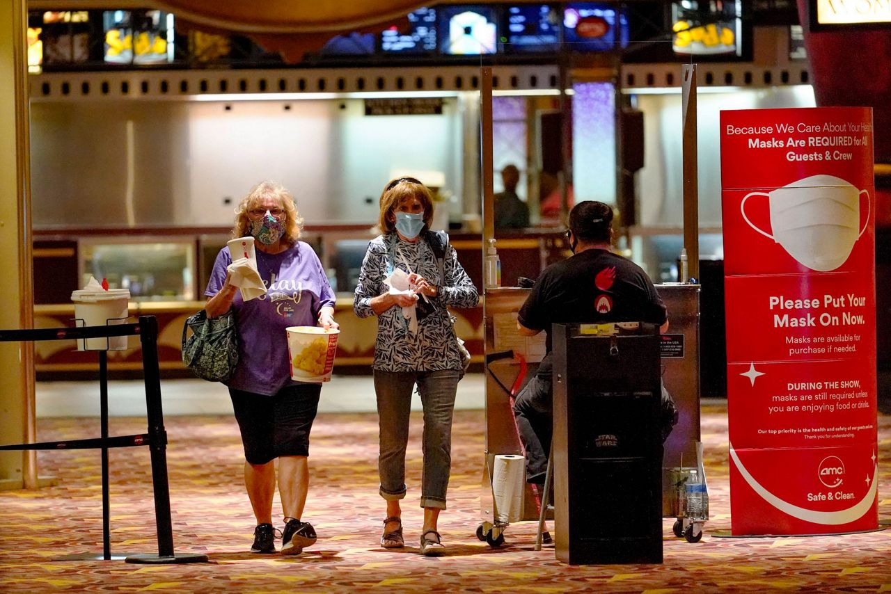 After 5 months, AMC Theaters reopens its doors, cautiously