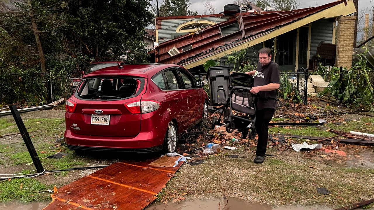 Big weather system presses east with storms, rain and snow