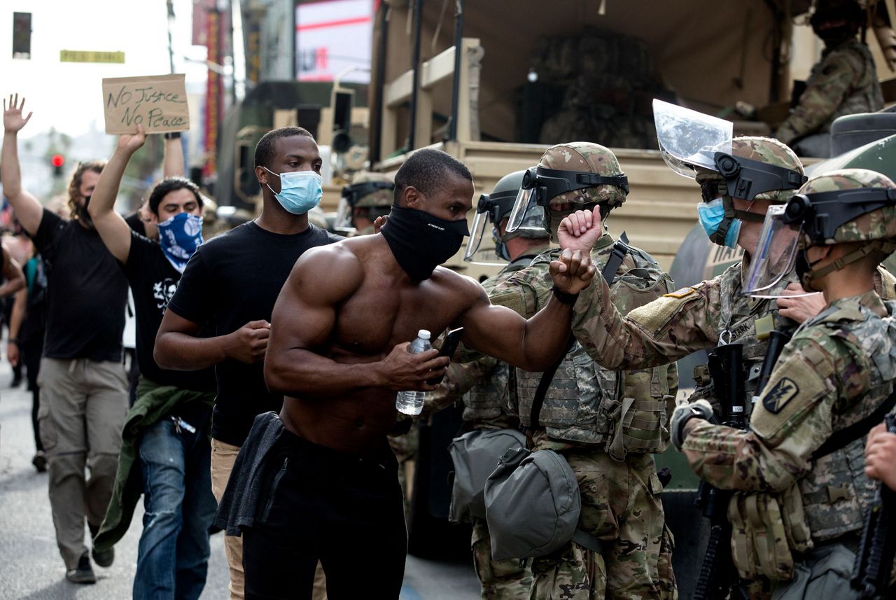 Nation's streets calmest in days, protests largely peaceful