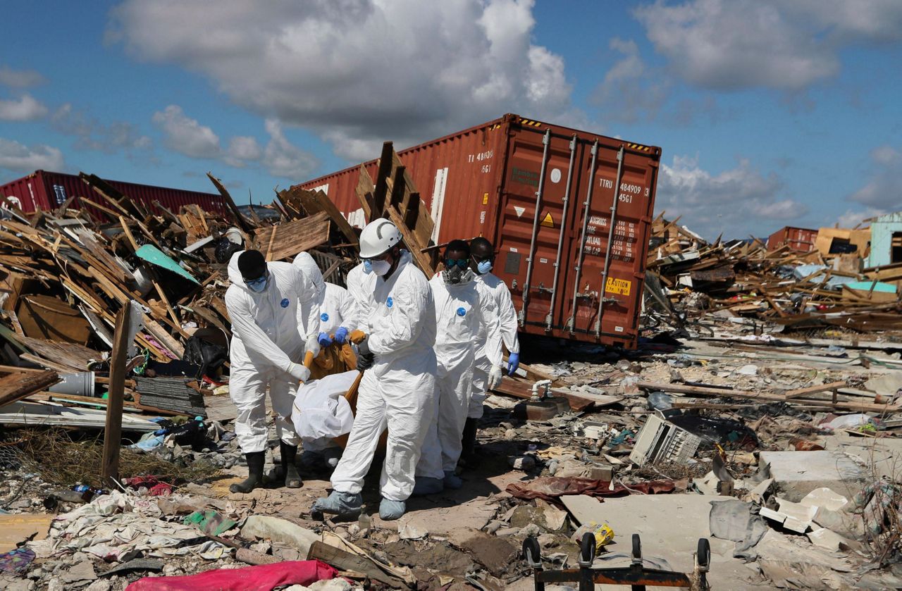 US emergency workers recover more bodies in Bahamas