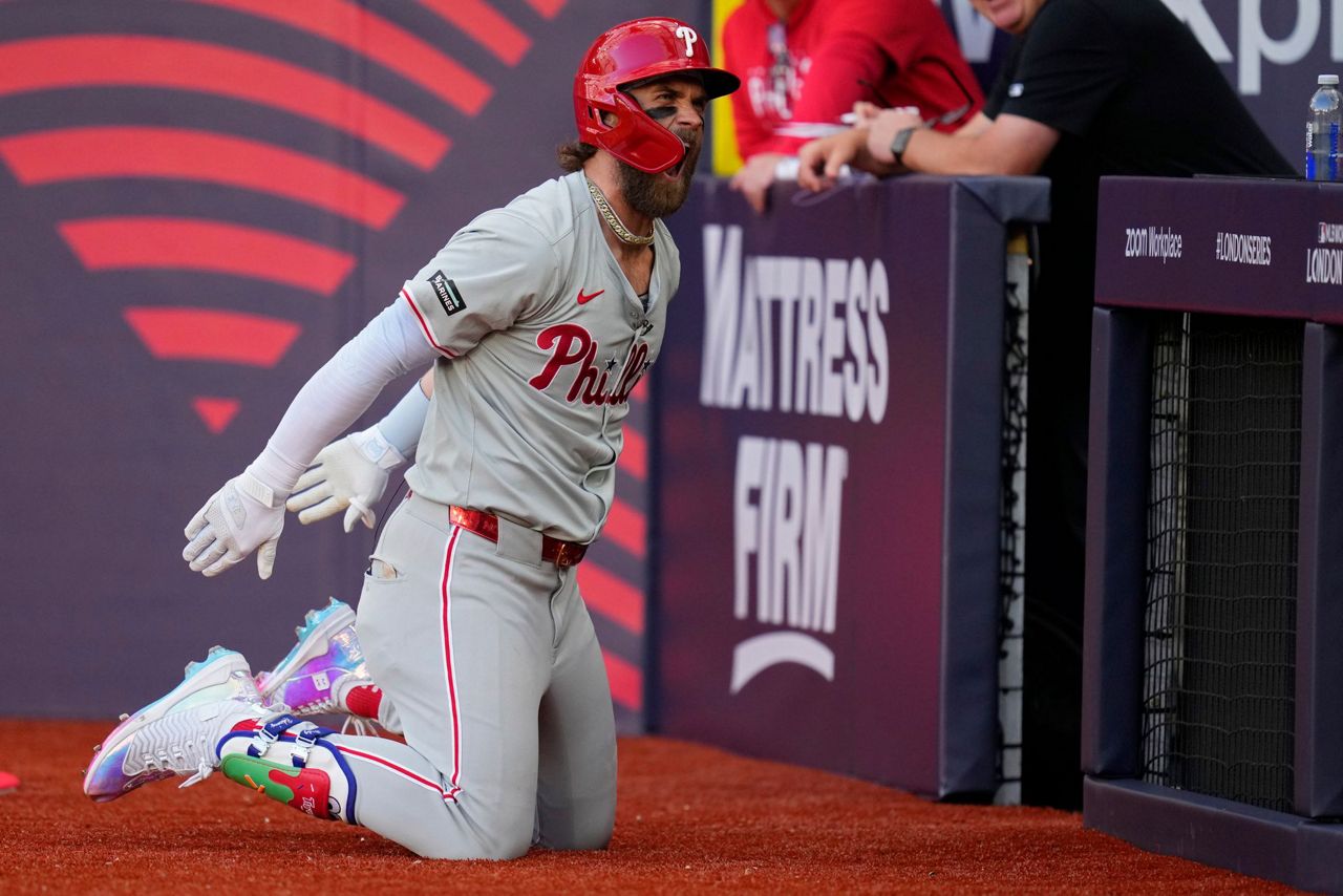 Phillies' Bryce Harper does soccer slide after homer in win over Mets ...
