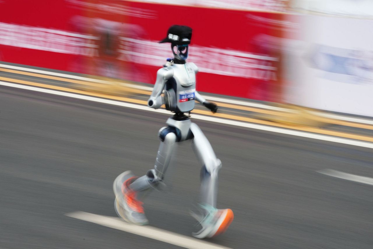 A humanoid robot sprints to victory in Beijing, beating the human half ...