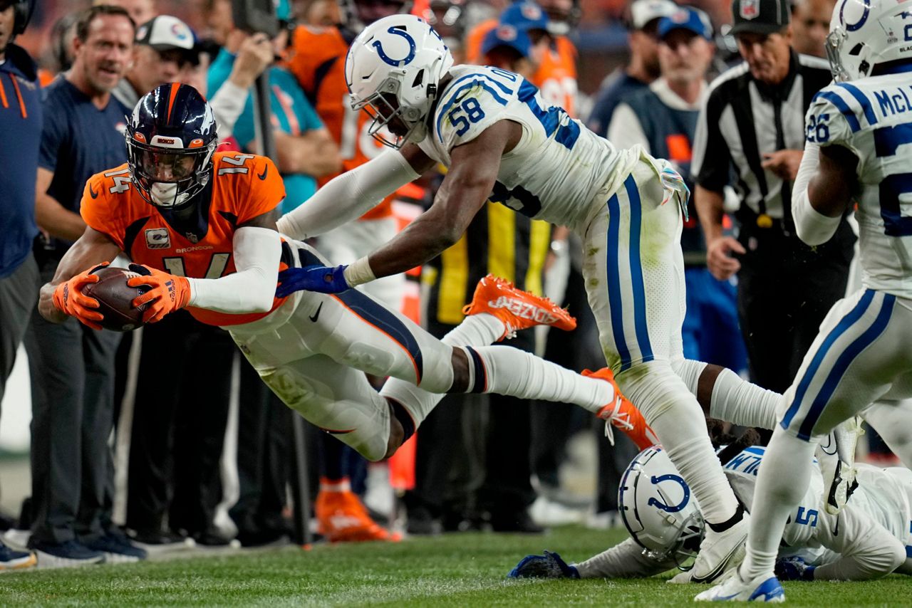 Colts grind out 12-9 win over Broncos in injury-filled game