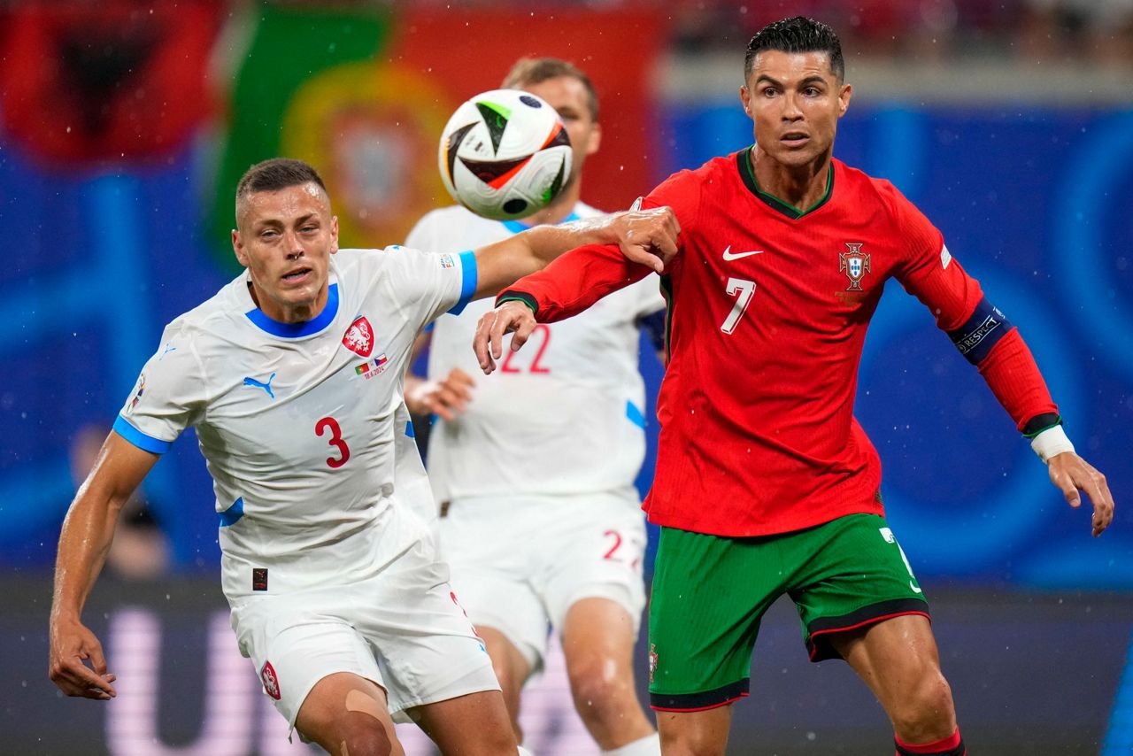 Cristiano Ronaldo captains Portugal to become the first player to play ...