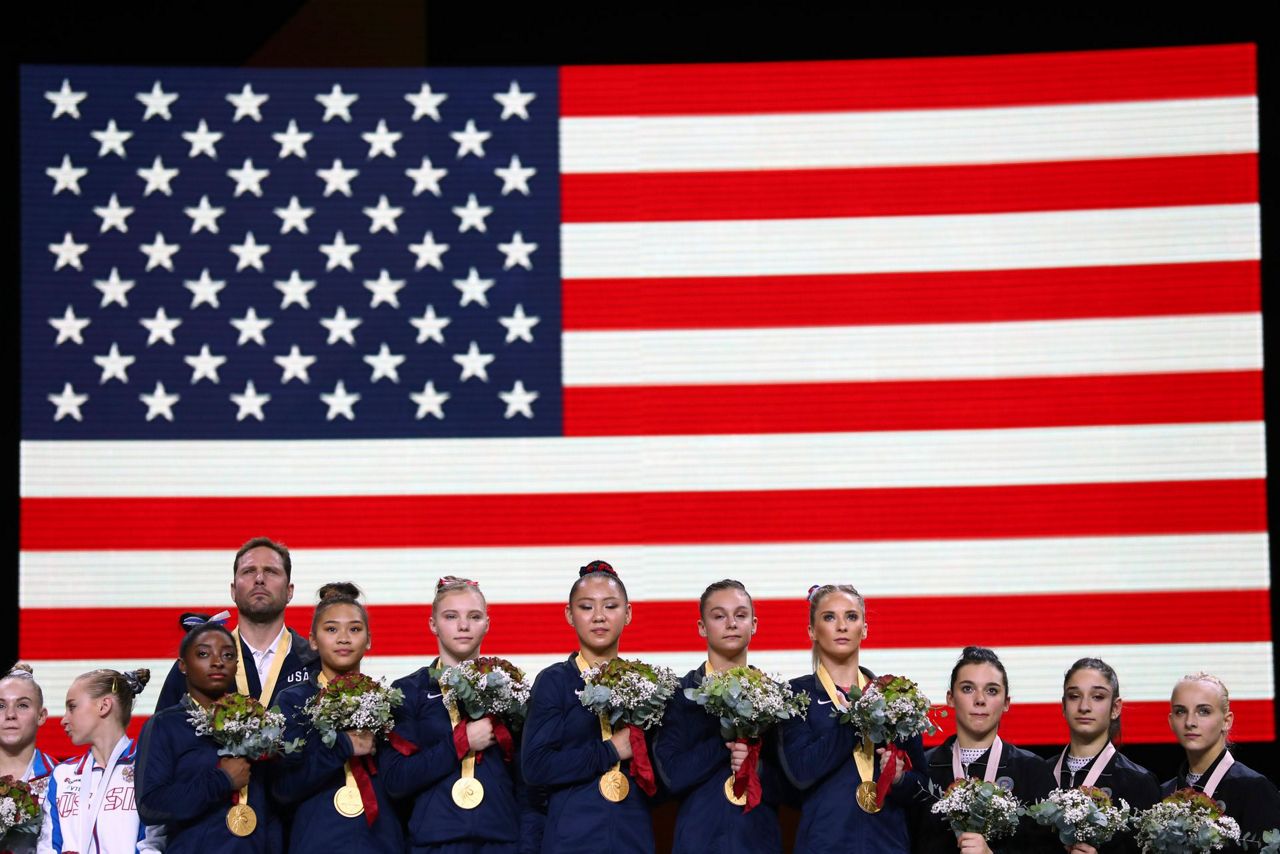 Biles sets new record as US wins world gymnastics team gold
