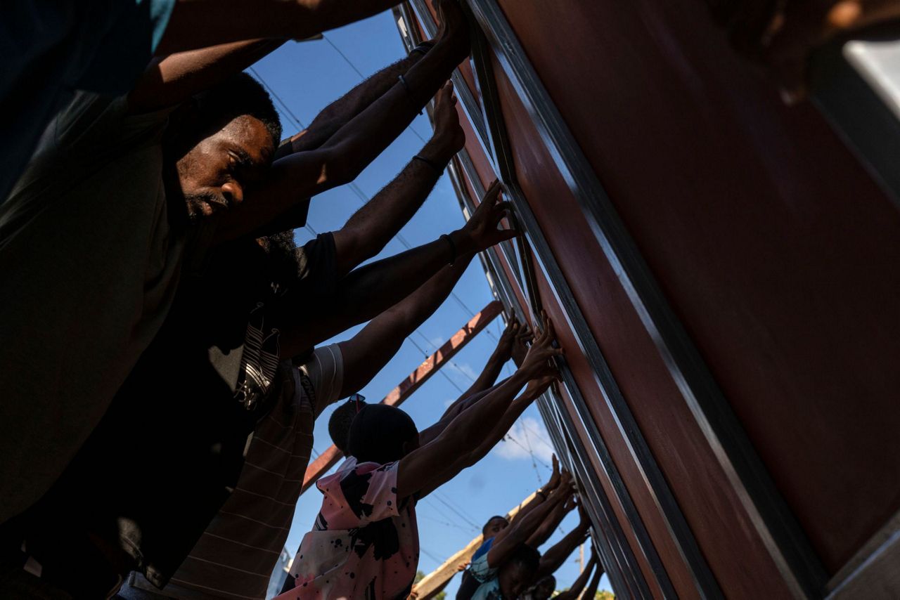 Haitians scramble to survive, seeking food, water and safety as gang ...