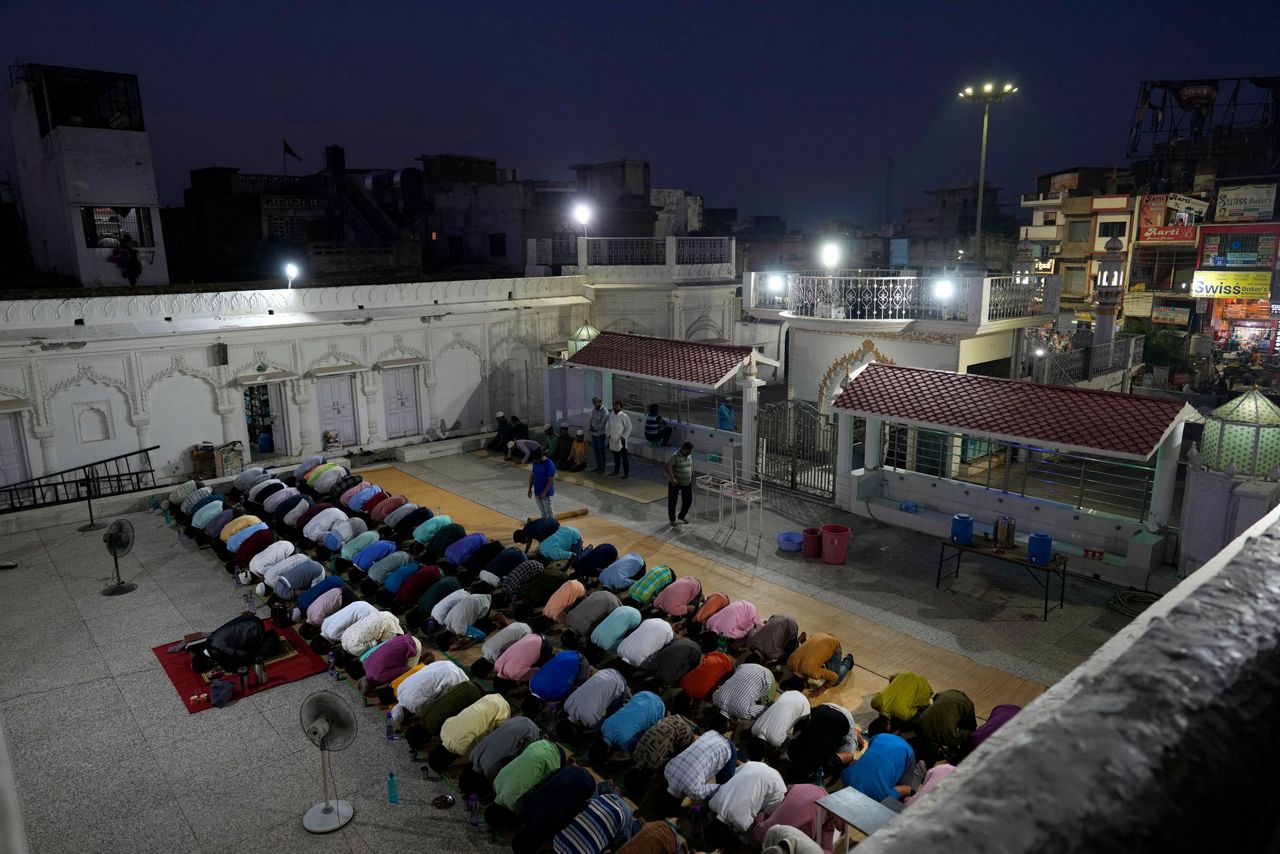 1 city, 2 people — and India’s widening religious divide