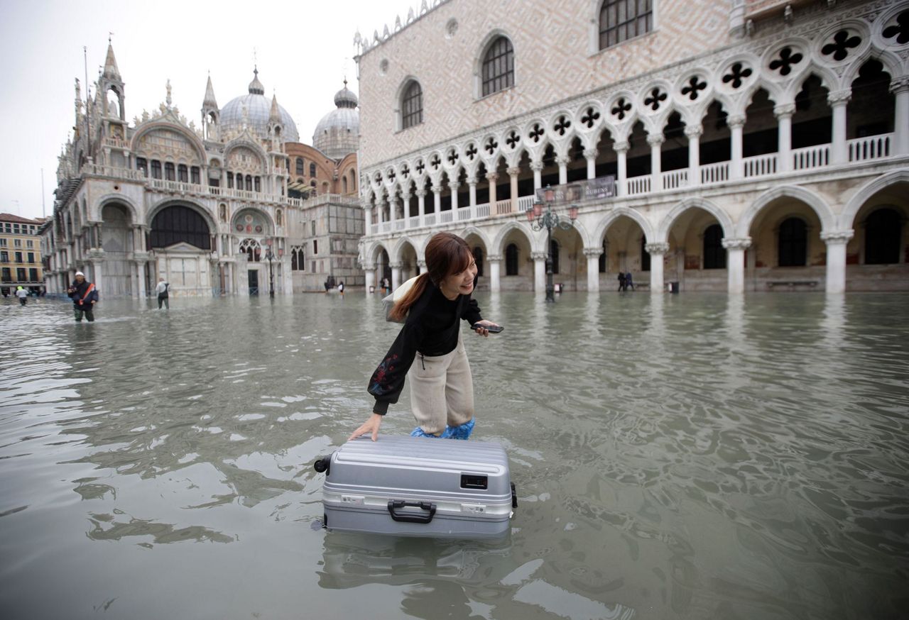 Venice flooding nearly touches level of infamous 1966 flood