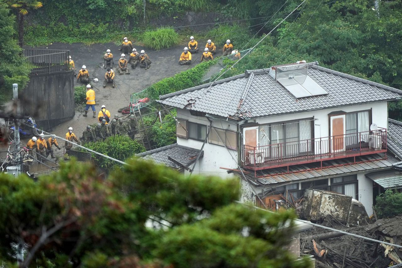 Japan's leader pushes rescue after deadly mudslide hits town