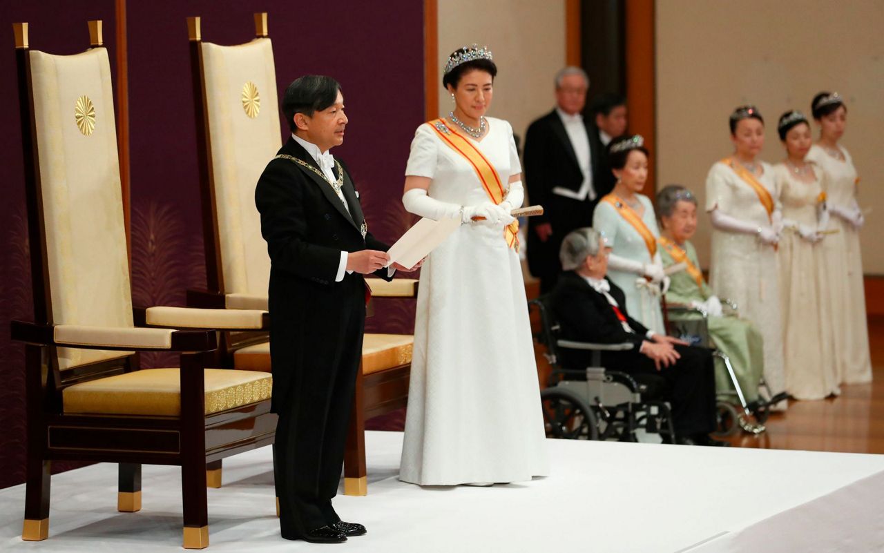 Emperor Naruhito takes throne day after his father abdicates