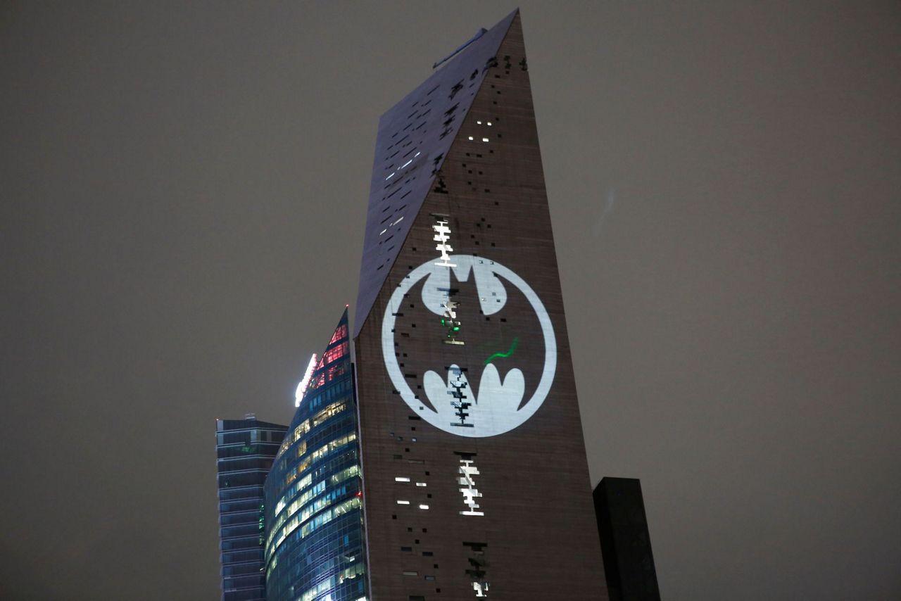 Holy anniversary! Displays of bat signal fete Batman at 80