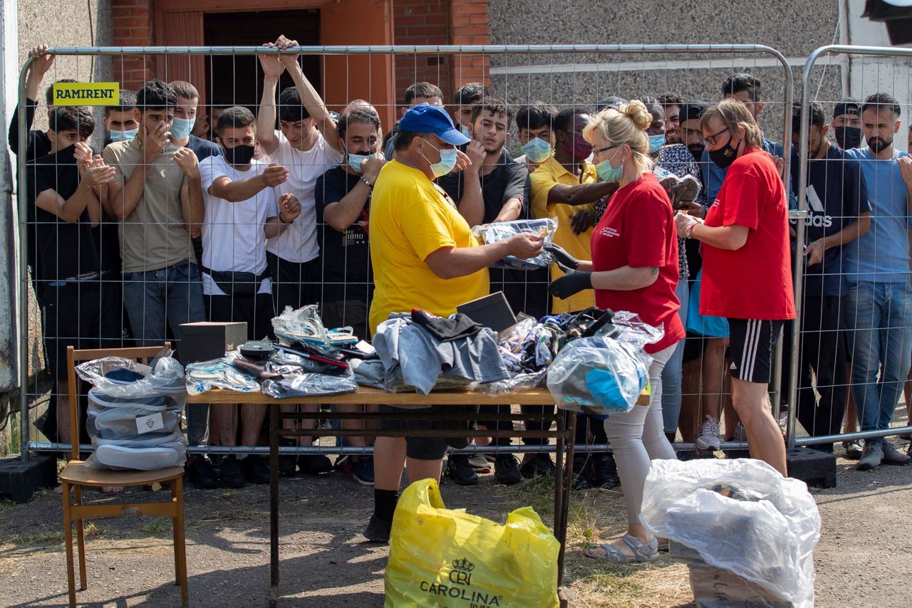 Lithuania struggles with migrant flood opened by Belarus