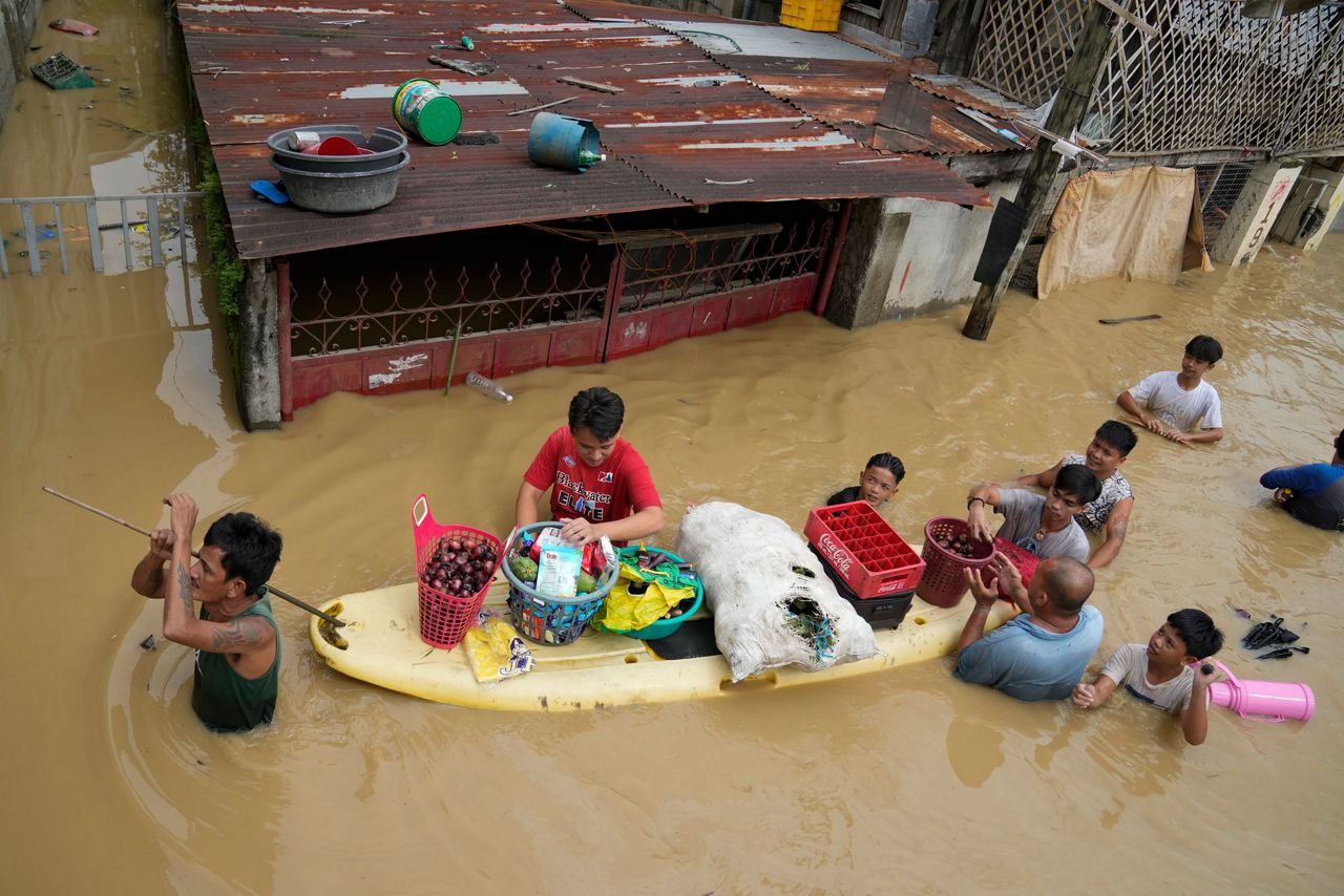 Powerful typhoon leaves 5 rescuers dead in north Philippines
