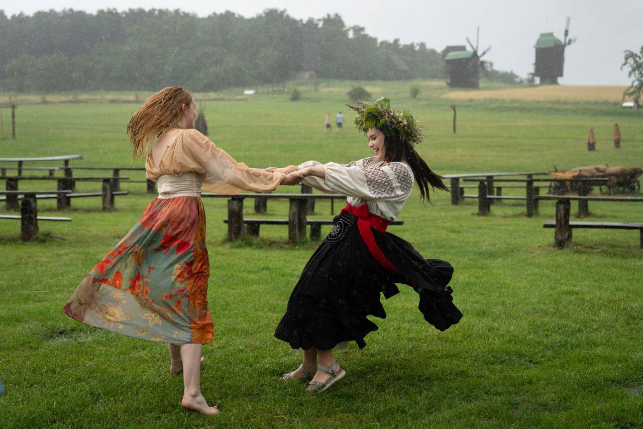 Under curfew, Ukrainians mark midsummer with bonfire jumping at a ...
