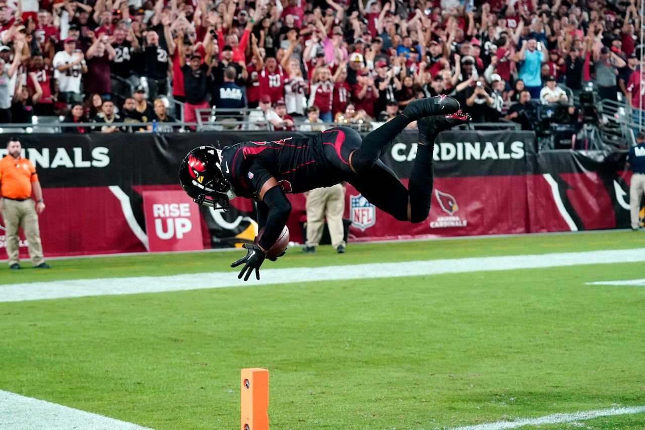 Cardinals use two pick-6s in first half to down Saints 42-34