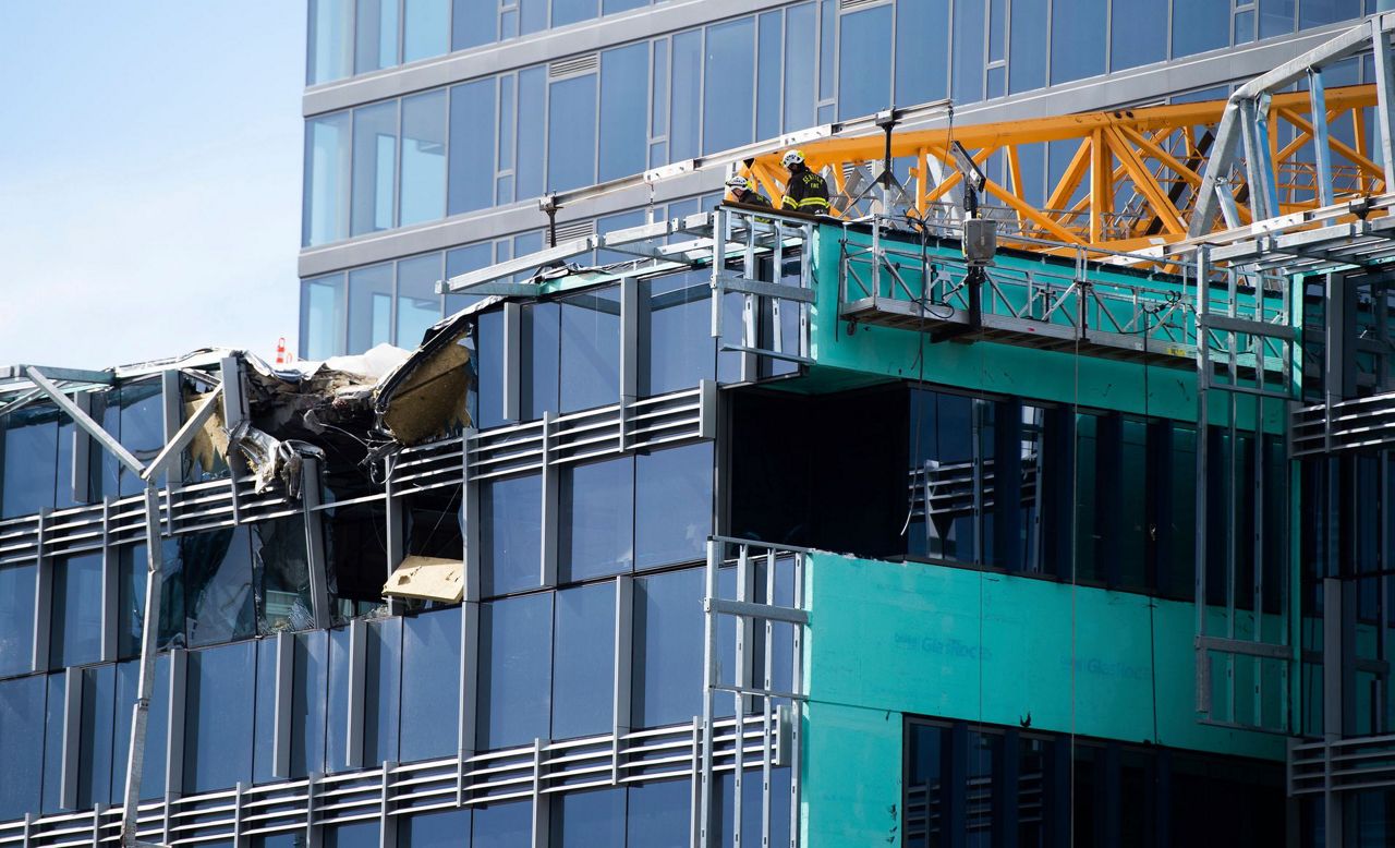Crane collapses in downtown Seattle on Saturday