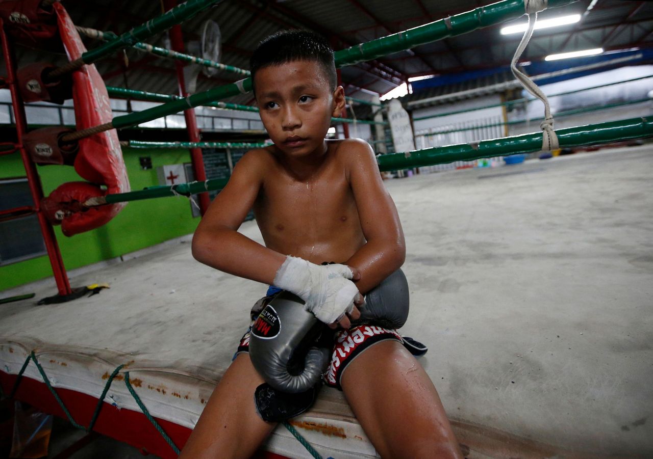 AP PHOTOS: The controversial world of Thai child kickboxing