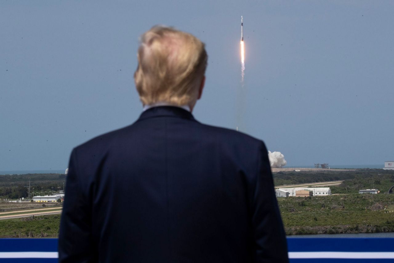 Launch provides Trump moment to relish during difficult week