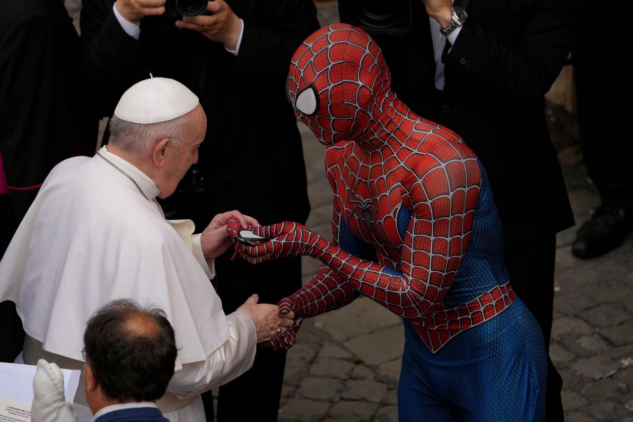 'Super-hero' in Spider-Man outfit meets pope at Vatican
