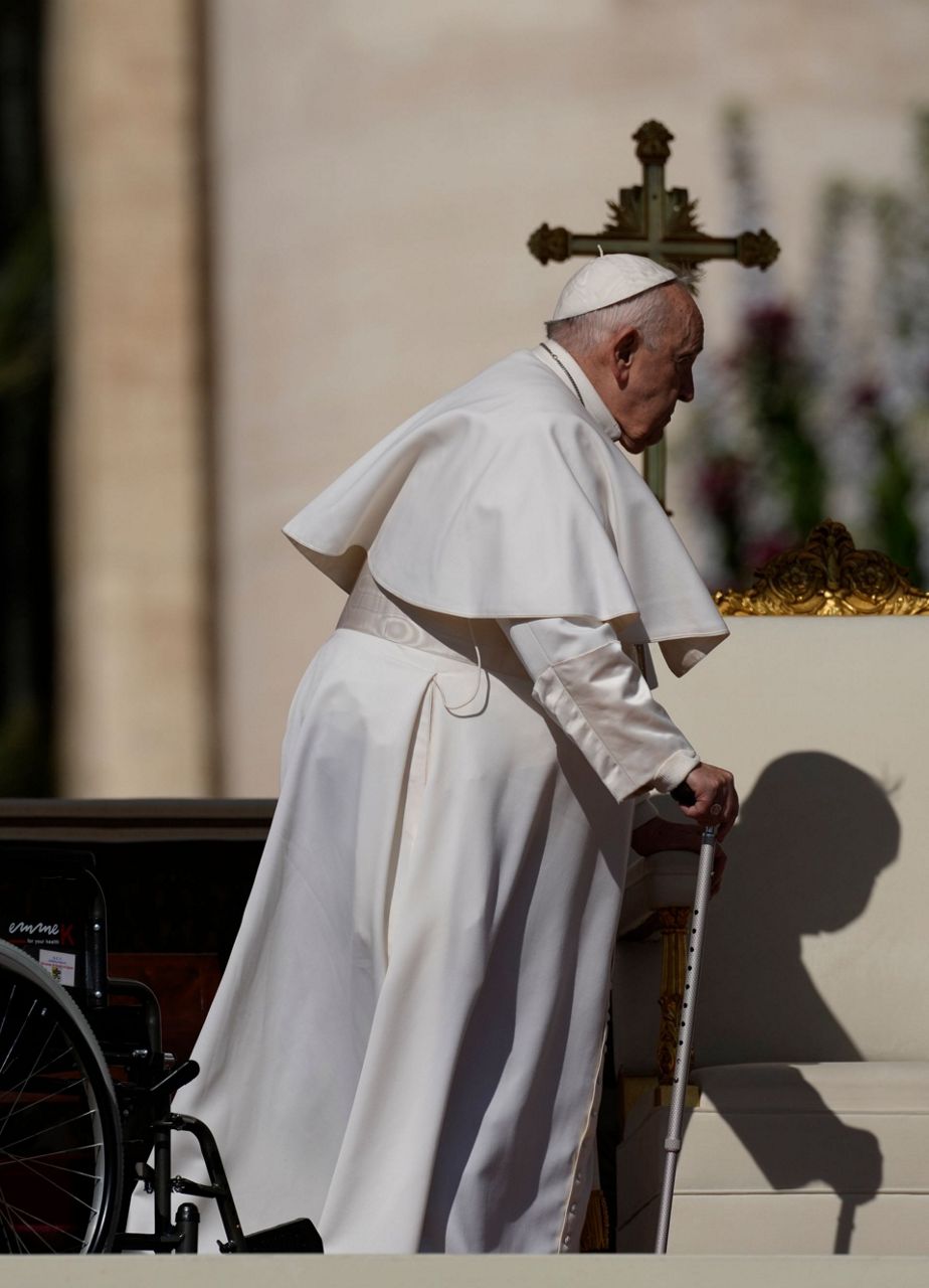 Pope, big crowd mark Easter in flower-adorned Vatican square