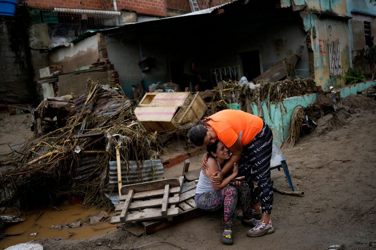 Rain-fueled landslide sweeps through Venezuela town; 22 dead