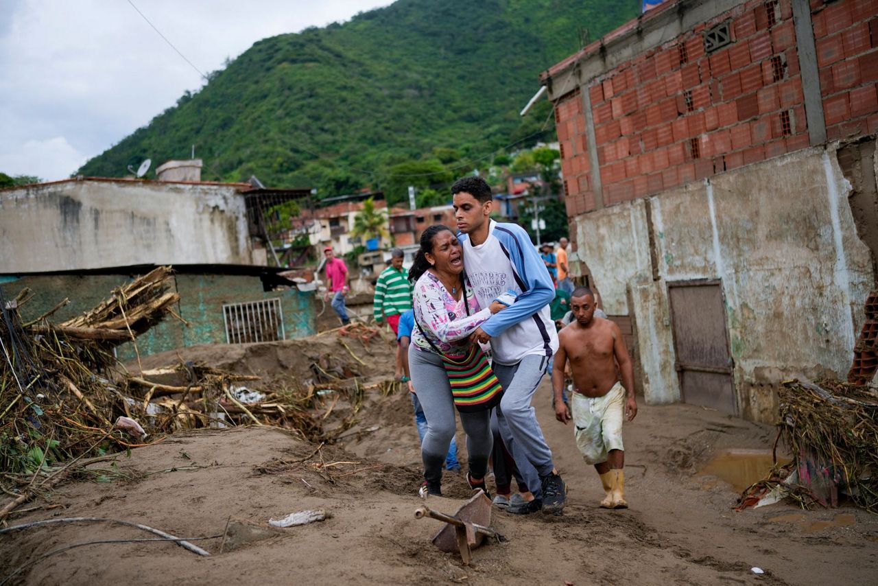 Rain-fueled landslide sweeps through Venezuela town; 22 dead