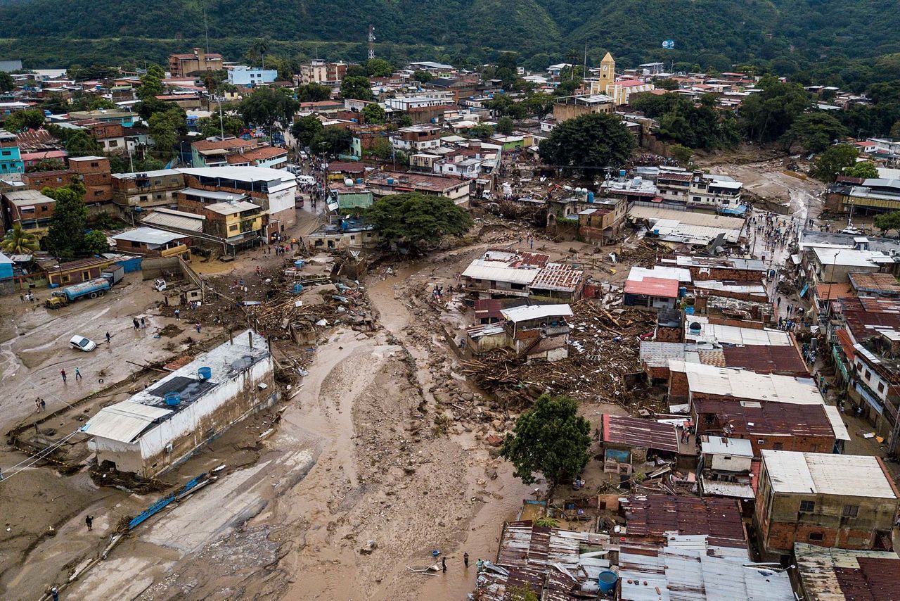 Rain-fueled landslide sweeps through Venezuela town; 22 dead