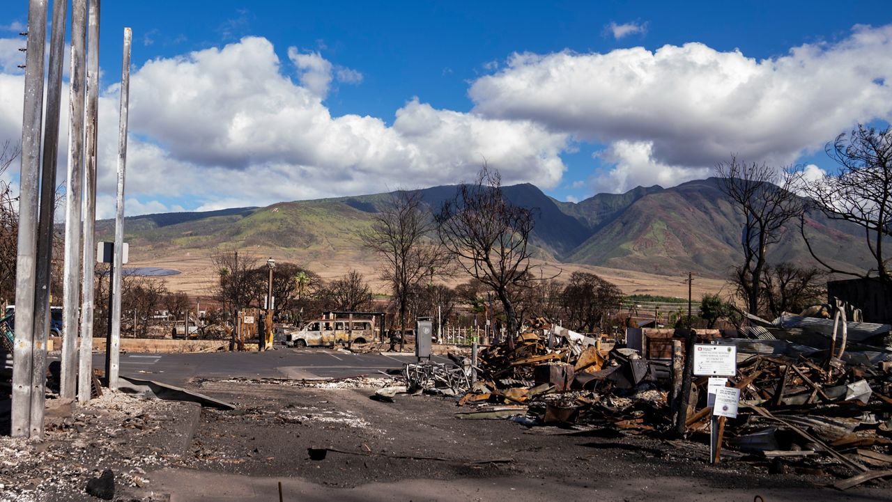 Hawaii's historic Lahaina, burned in wildfire, reopens