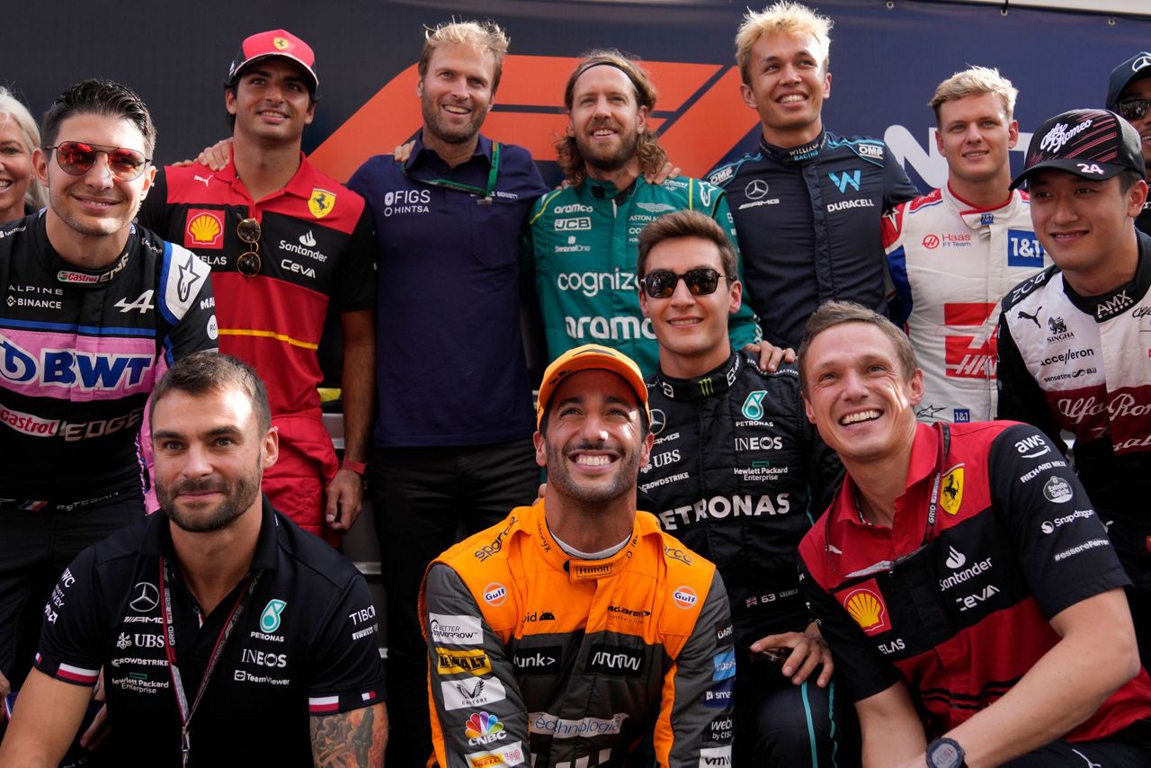 F1 champion, activist Vettel bids farewell after final race