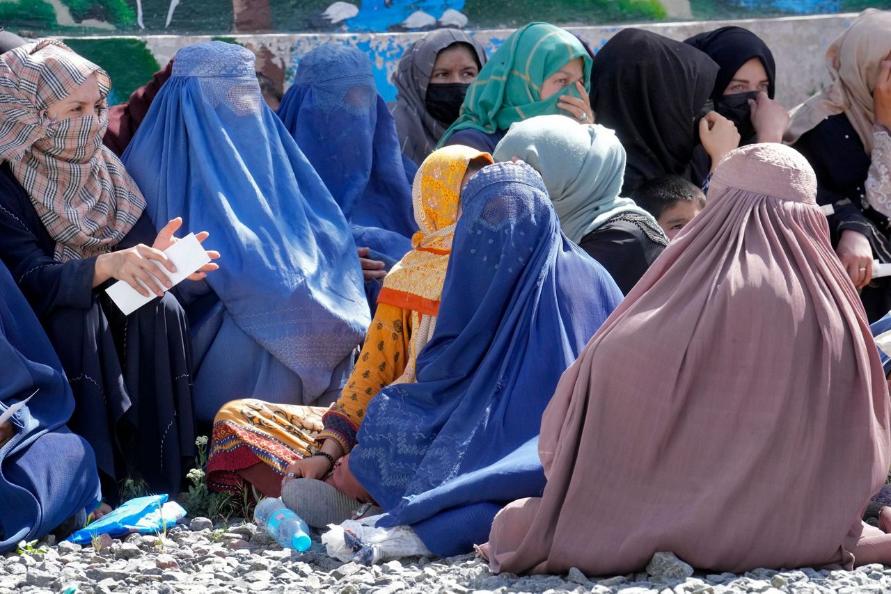 Afghanistan's Taliban order women to wear burqa in public