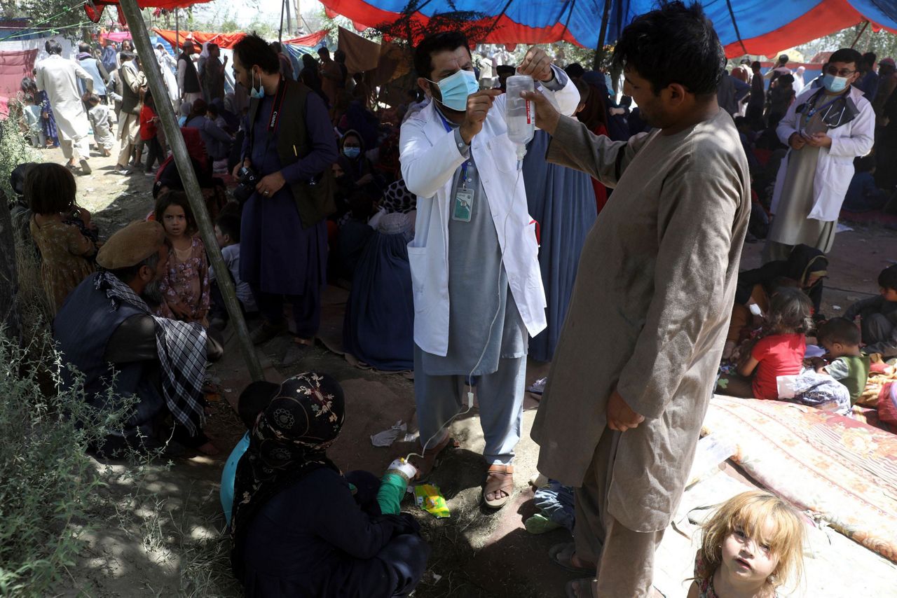 Fleeing fighting in north, Afghans crowd into Kabul's parks