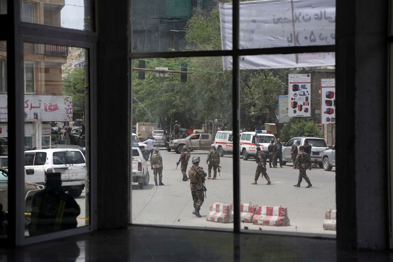 Afghan officials: Large explosion, gunfire in capital