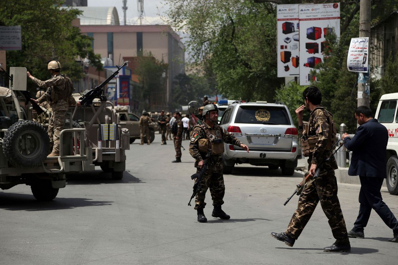 Afghan officials: Large explosion, gunfire in capital