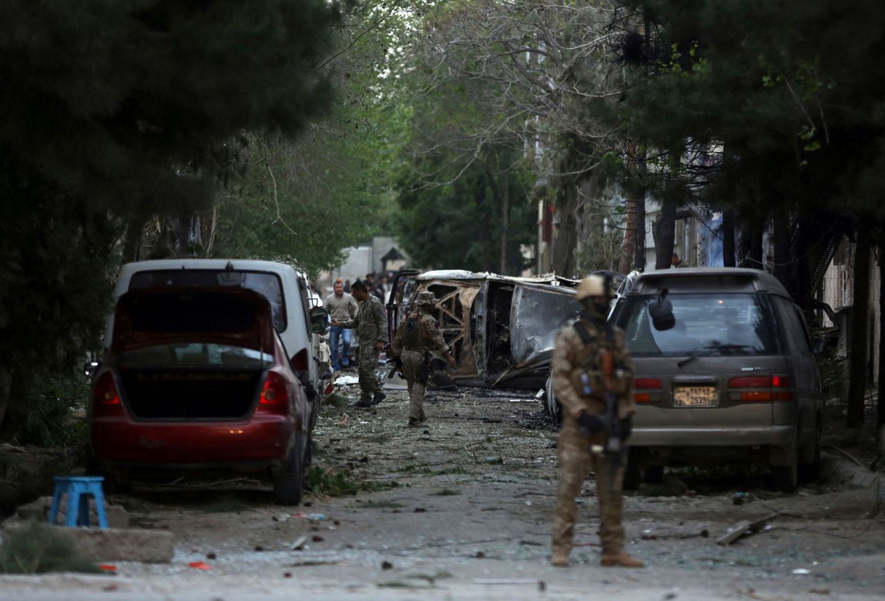 Afghan officials: Large explosion, gunfire in capital