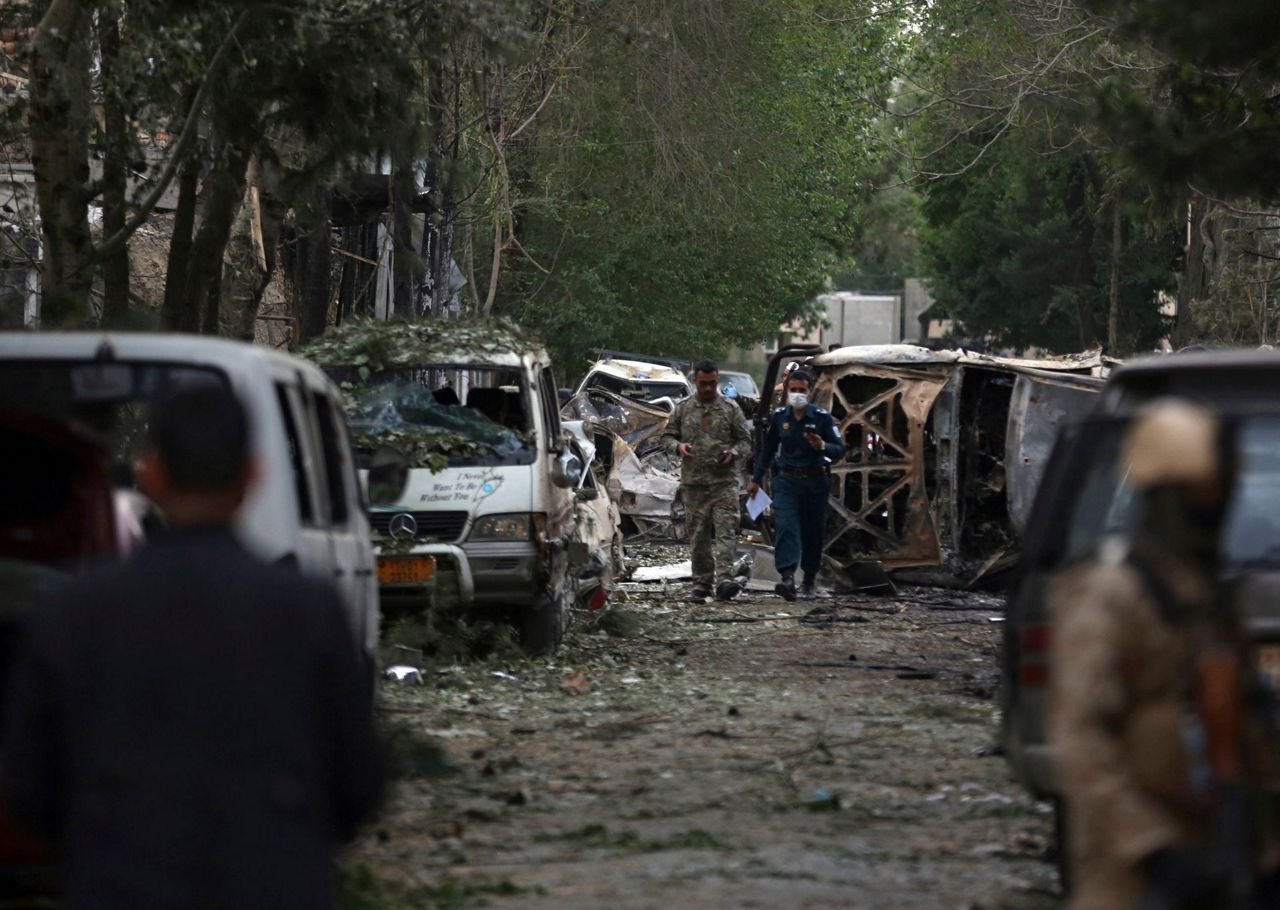 Afghan officials: Large explosion, gunfire in capital