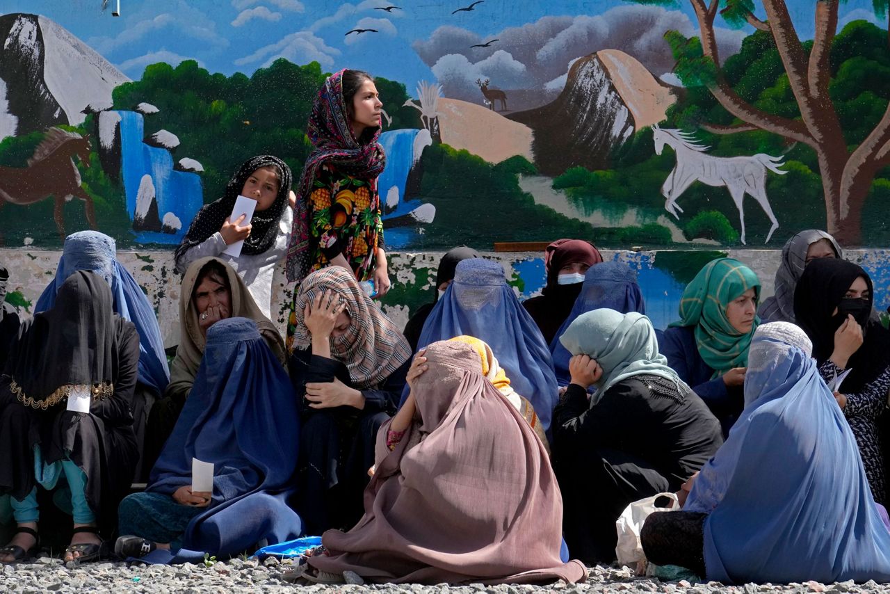 Afghanistan's Taliban order women to wear burqa in public