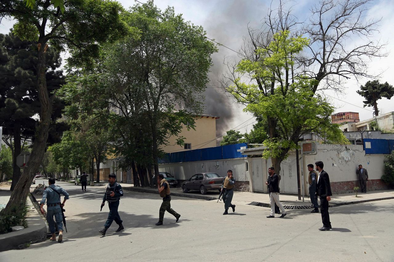 Afghan officials: Large explosion, gunfire in capital