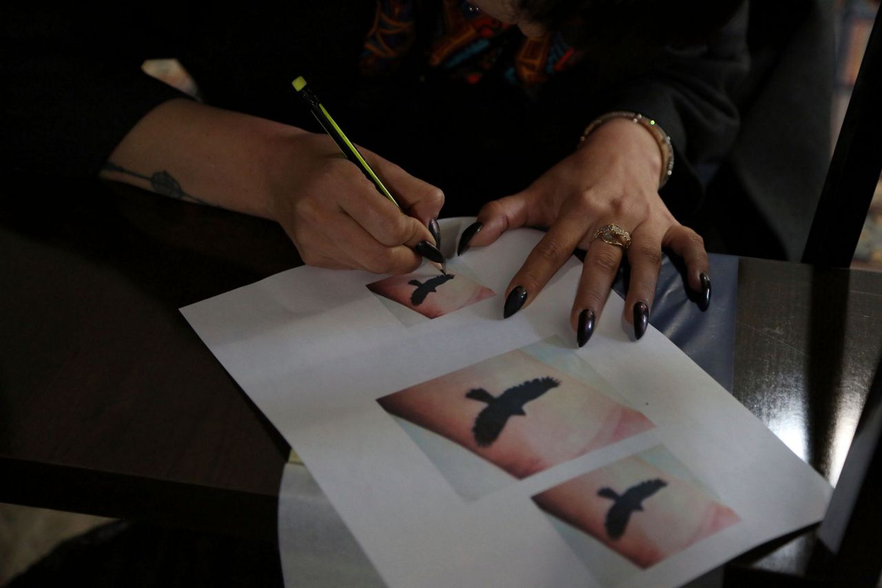 A tattoo at a time, Afghan woman takes on society’s taboos