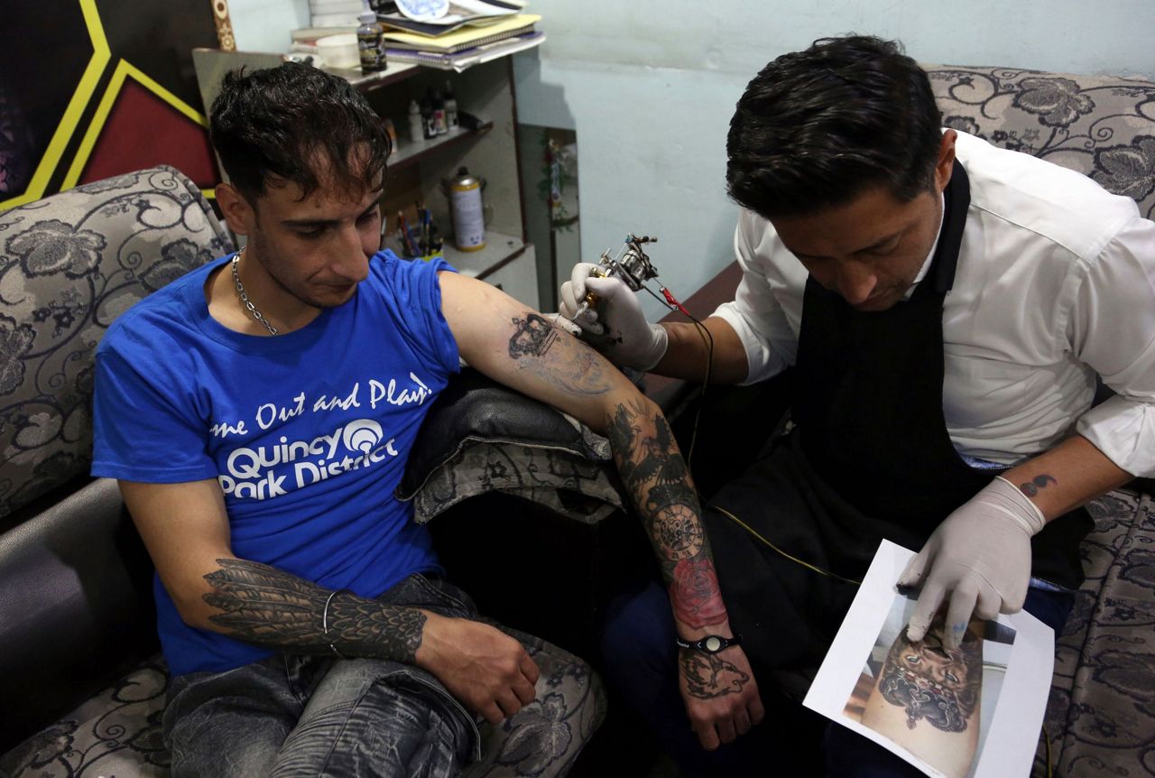 A tattoo at a time, Afghan woman takes on society’s taboos