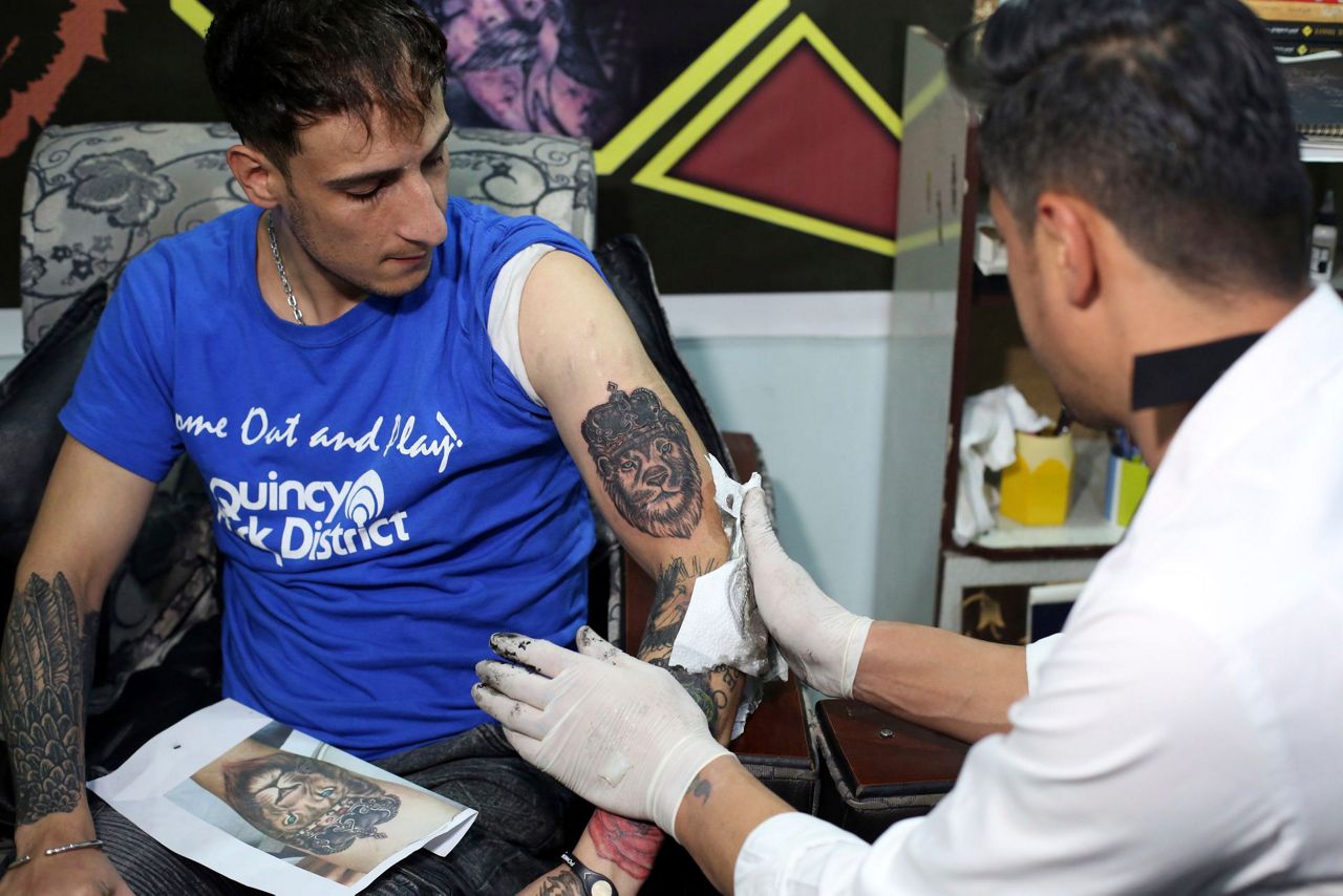 A tattoo at a time, Afghan woman takes on society’s taboos