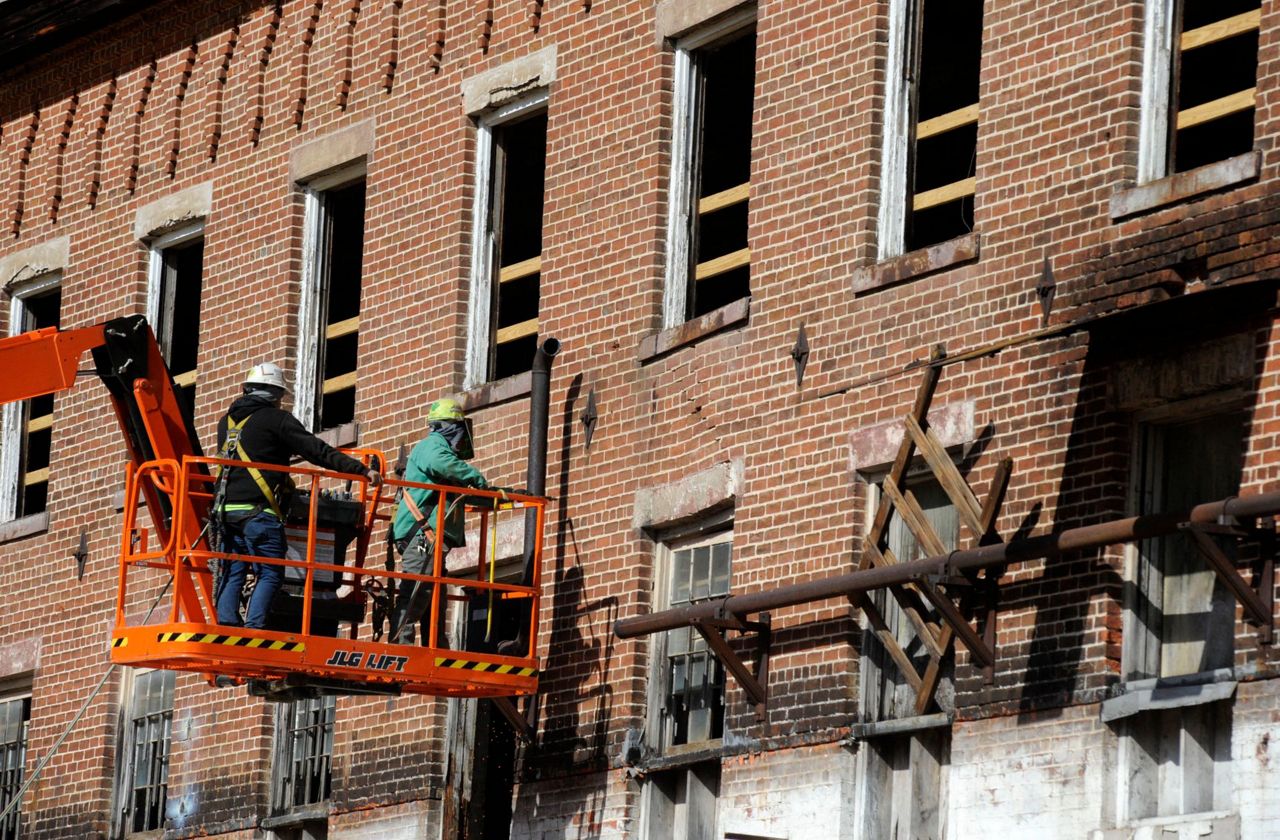Slavery's ghost haunts cotton gin factory's transformation
