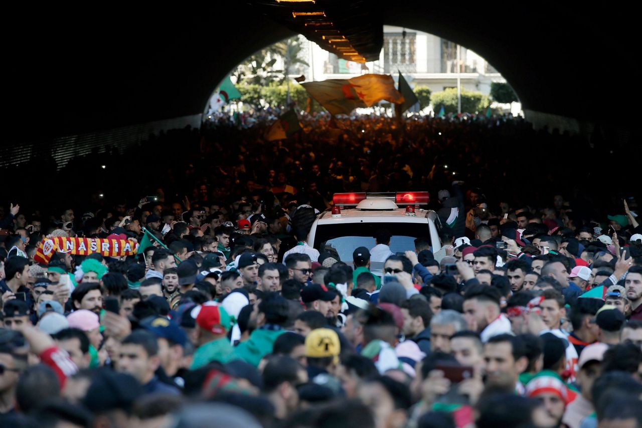 The Latest: Algerian police fire water cannon at protesters