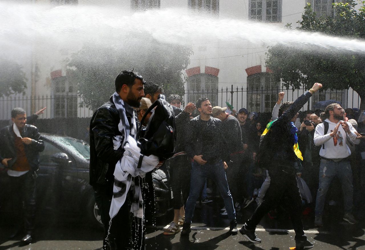 The Latest: Algerian police fire tear gas at protesters