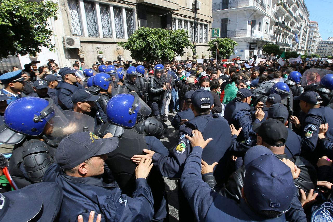 The Latest: Algerian police fire tear gas at protesters
