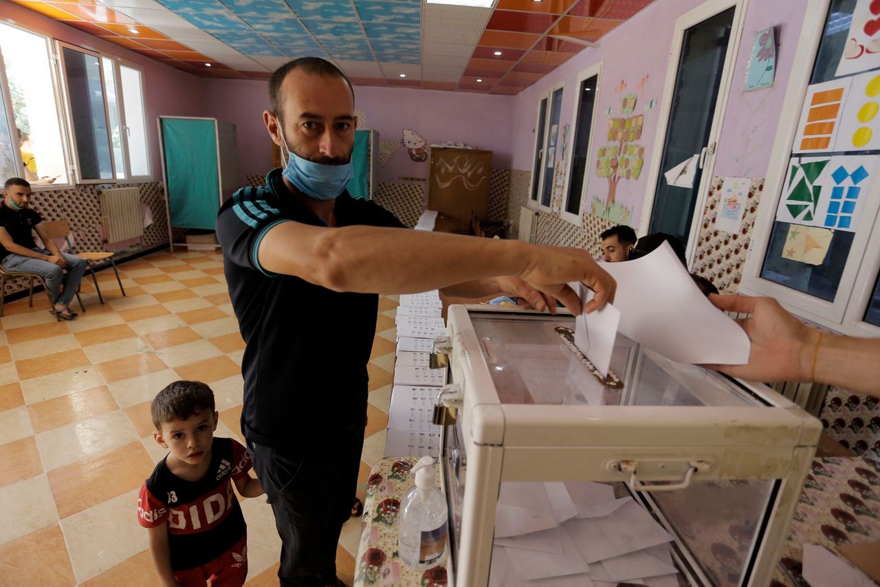 Algeria votes for new parliament but activists plan boycott